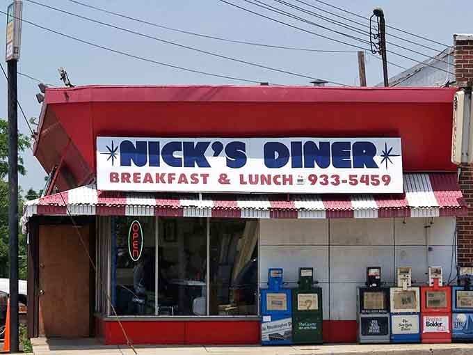 That bold red awning and striped canopy practically shout "breakfast is ready!" from down the block.