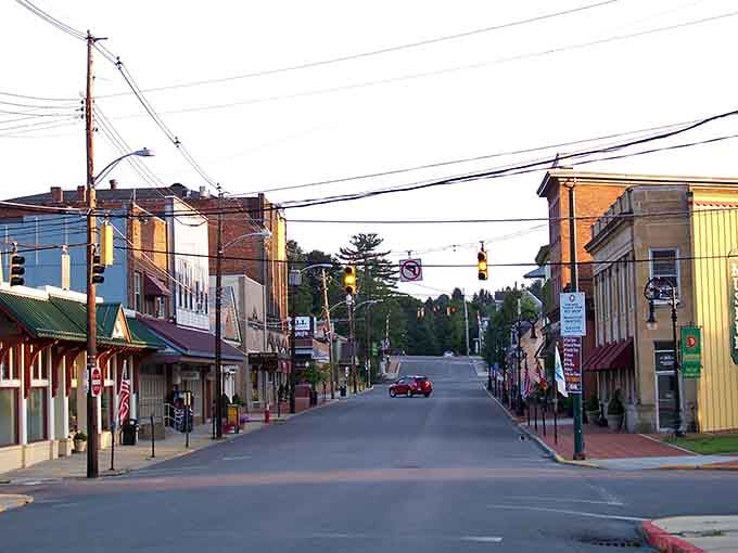 Oakland's main street stretches out like a welcoming handshake, colorful storefronts lining both sides perfectly.