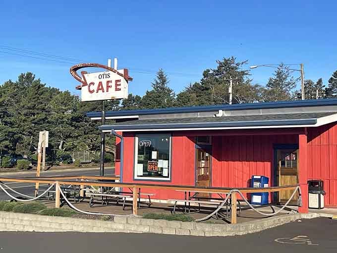 That vintage sign and bright red building tell you everything: this coastal cafe means serious breakfast business.