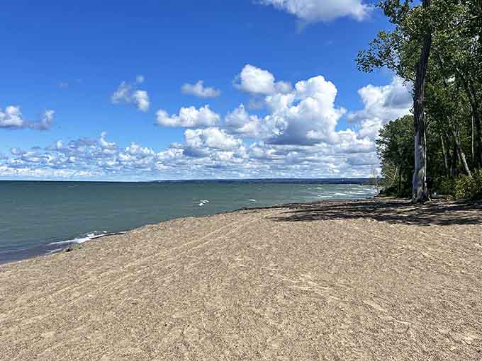 Look at those puffy clouds dancing over Lake Erie's shoreline like nature's own cotton candy display.