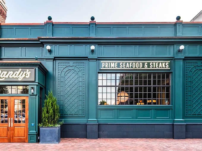 That gorgeous teal facade promises prime cuts and fresh catches behind those elegant windows and doors.