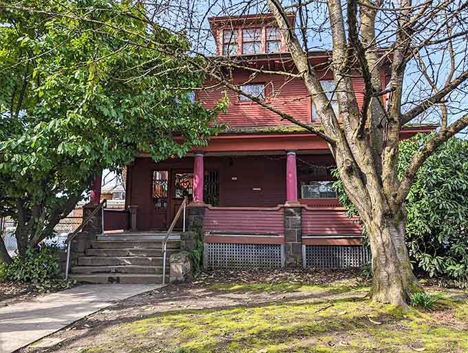 This charming Victorian house hides Portland's quirkiest dining secret behind those pink columns and welcoming front steps.
