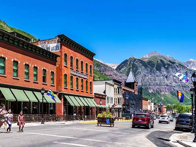 When historic brick buildings meet towering peaks, you get Telluride's main street looking like a Western movie set.