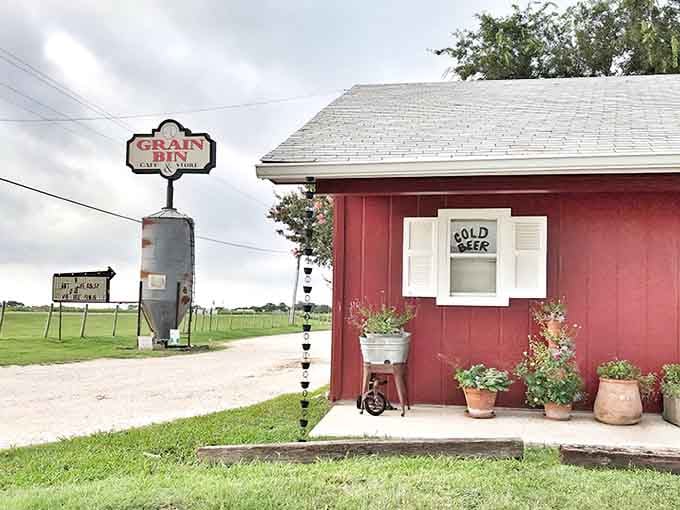 That grain bin standing sentinel out front isn't just decoration, it's a promise of authentic country goodness ahead.