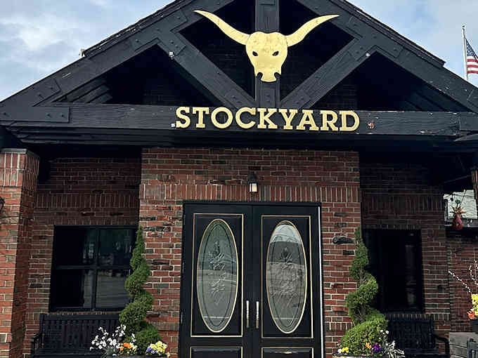 That golden bull head watching over the entrance promises serious steakhouse business inside those welcoming doors.