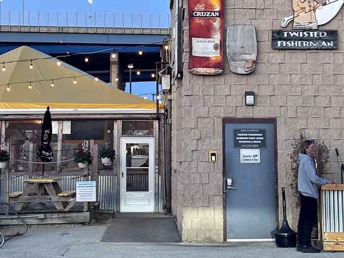 String lights and outdoor seating create the perfect waterside vibe where fresh seafood meets Milwaukee's industrial charm.