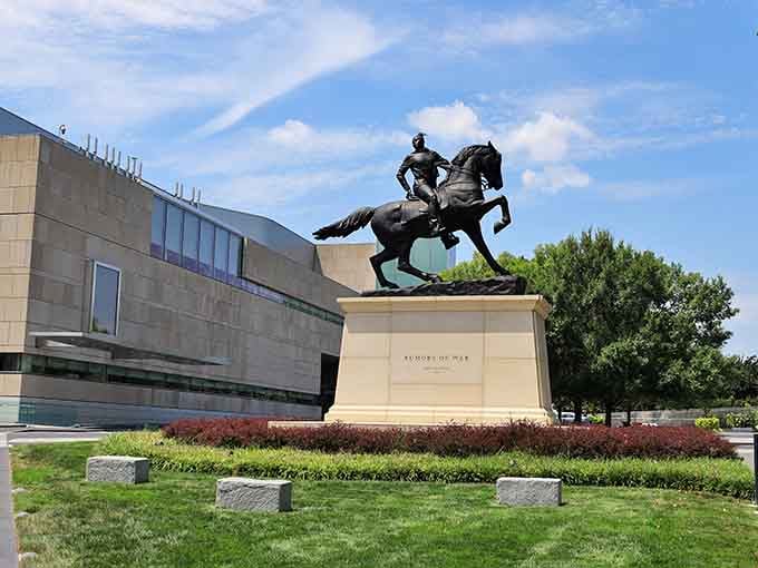 That dramatic equestrian statue stands guard like a bronze sentinel, welcoming visitors to world-class art without charging admission.
