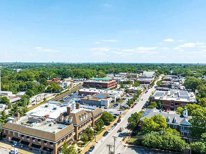 From above, this tree-lined community looks like someone carefully arranged a Norman Rockwell painting with actual buildings.