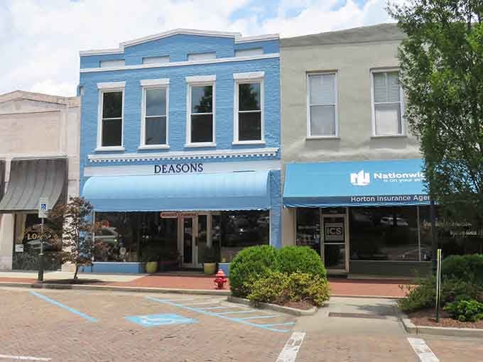That cheerful blue storefront brightens the whole block like a smile on a cloudy day.