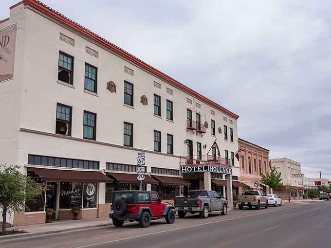 The Hotel Holland anchors this mountain town's main street, standing proud like a guardian of simpler, sweeter times.