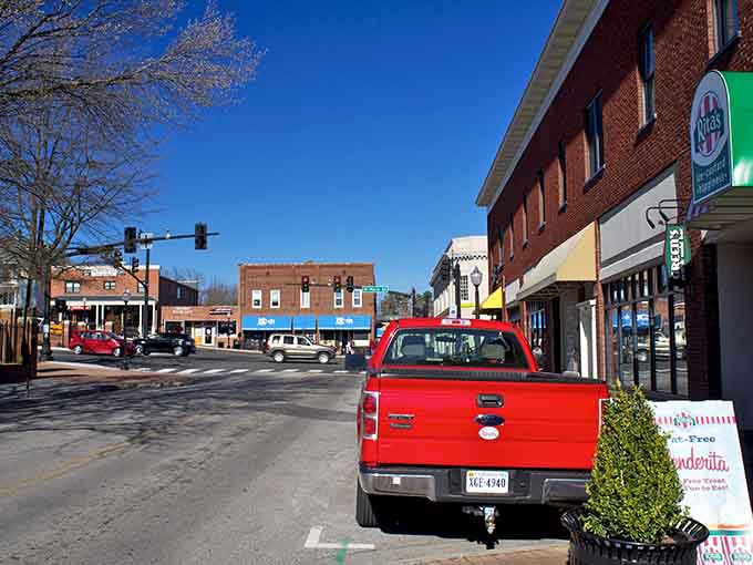 That bright blue sky frames Main Street perfectly, where local shops invite you to slow down and browse.
