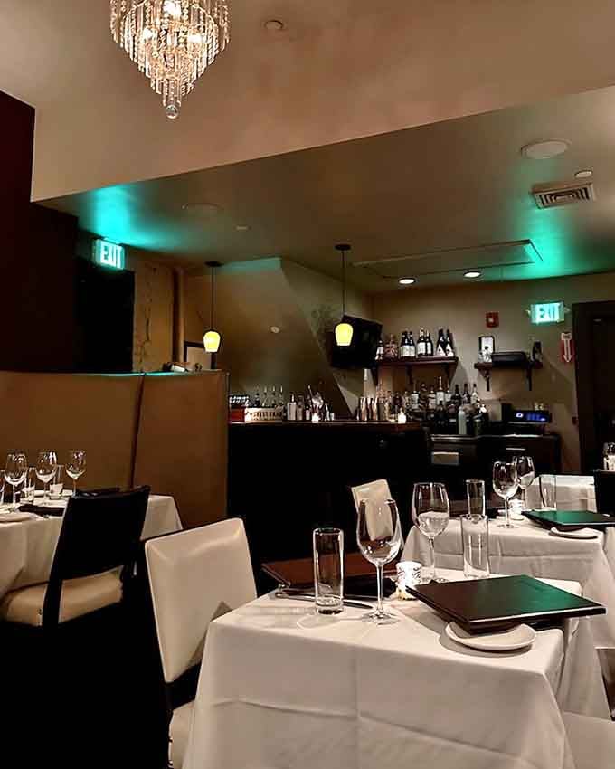 Crystal chandeliers and crisp white linens prove that downtown elegance doesn't require pretension, just perfectly prepared beef and thoughtful service.