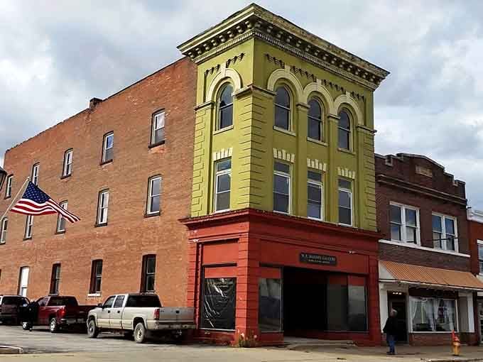 That yellow and orange corner building pops like a vintage postcard, proving affordable towns still have serious style.
