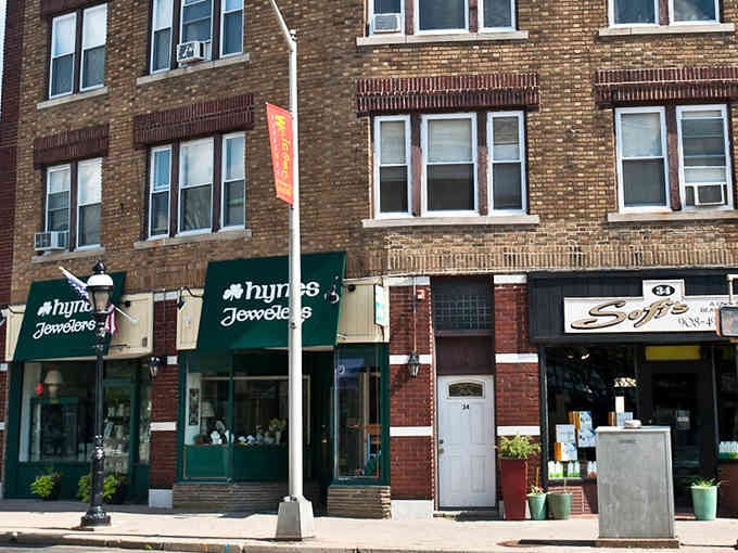 Brick buildings and local shops create that timeless Main Street America vibe we all remember from simpler times.