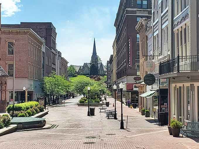 That church steeple framing the end of the street is like nature's exclamation point on small-town perfection.