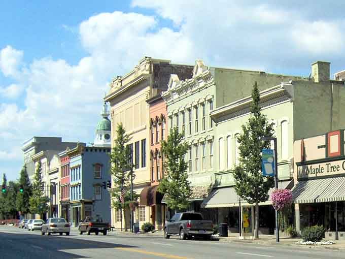 These colorful storefronts stand shoulder to shoulder like old friends sharing stories across the generations.