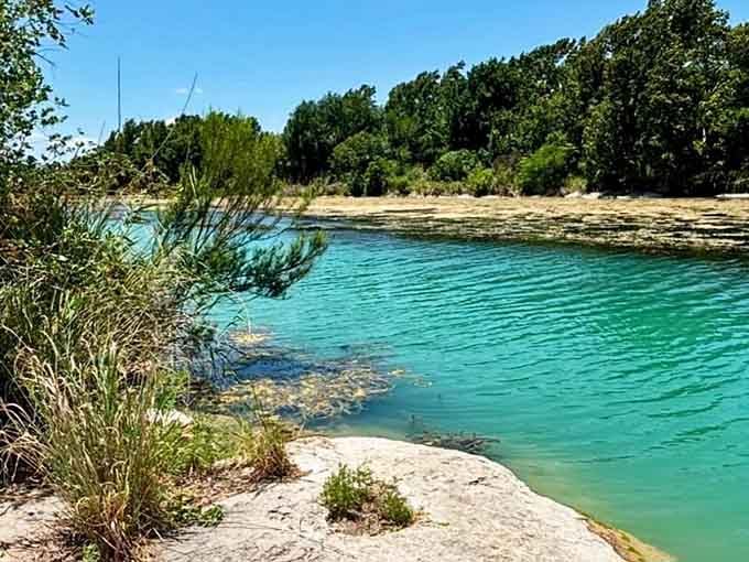 That limestone shoreline frames water so pristine you'll swear someone's playing tricks with the color saturation on your eyes.