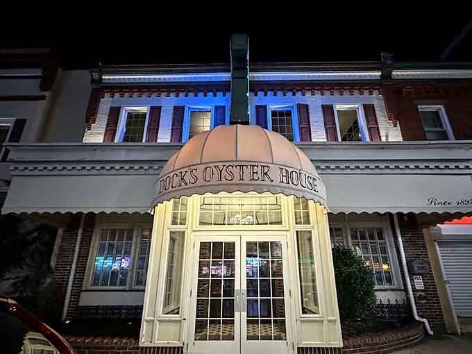 When the blue lights glow at night, that elegant curved entrance beckons you inside for oysters and memories.