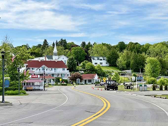 The gentle curve of the road leads you into a village where church steeples and harbor views create pure magic.