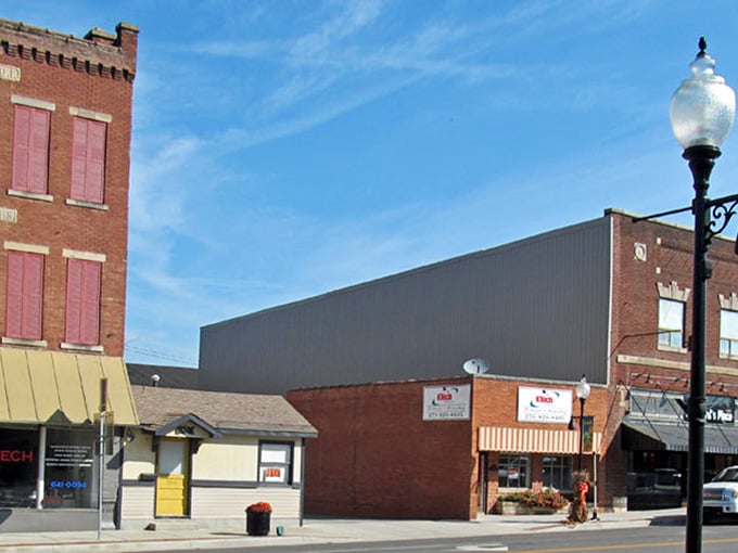 Classic awnings and vintage lampposts create a Main Street that looks ready for its close-up.