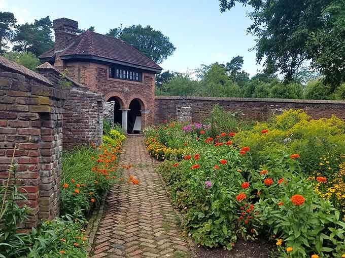 Follow the herringbone brick path through wildflowers to discover what secrets lie beyond those arched doorways.