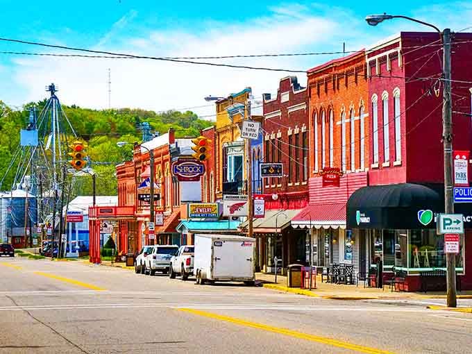 Those colorful facades practically glow in the sunshine, inviting you to slow down and explore every charming shop along the way.