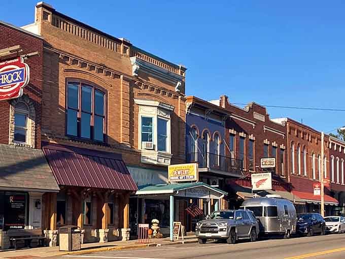 Classic brick buildings with ornate details prove that small-town architecture can steal the show every time.