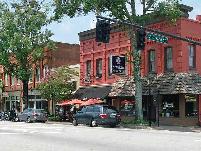 Red brick buildings and outdoor dining under leafy trees prove downtown charm never goes out of style.
