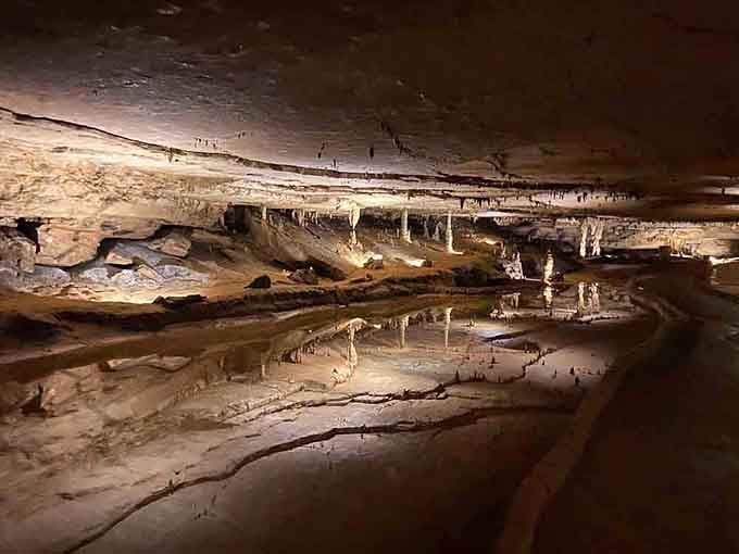 These delicate stone formations mirror themselves in still pools, creating an otherworldly double feature beneath your feet.