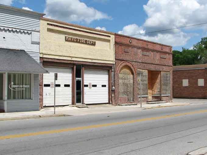 The old fire department stands proud, a testament to community spirit that's kept this town safe for decades.