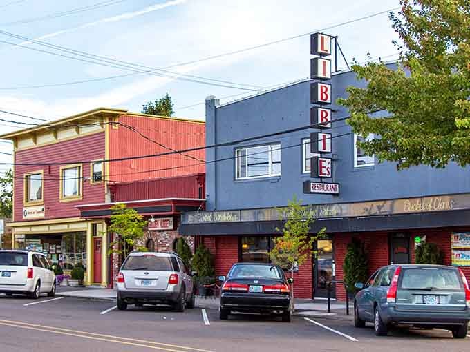 That vintage restaurant sign stands proud, reminding everyone that small-town charm never goes out of style.