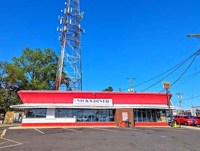 Under that brilliant blue sky, this classic red-and-white diner stands proud as a neighborhood breakfast champion.
