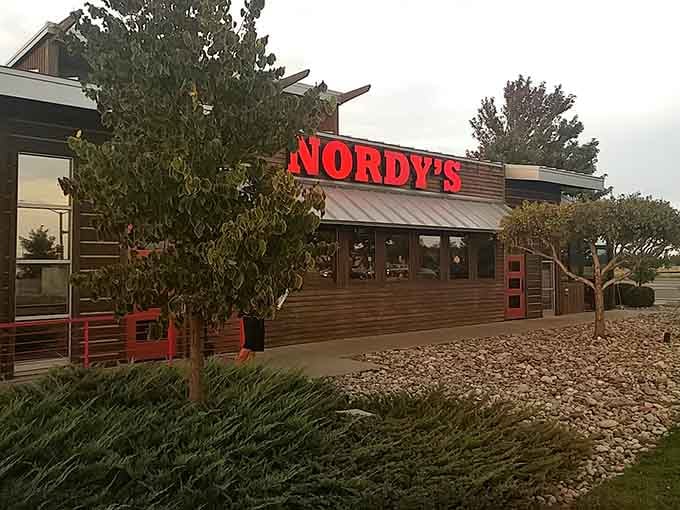 The landscaping and welcoming entrance hint at a place where attention to detail extends from curb to plate.