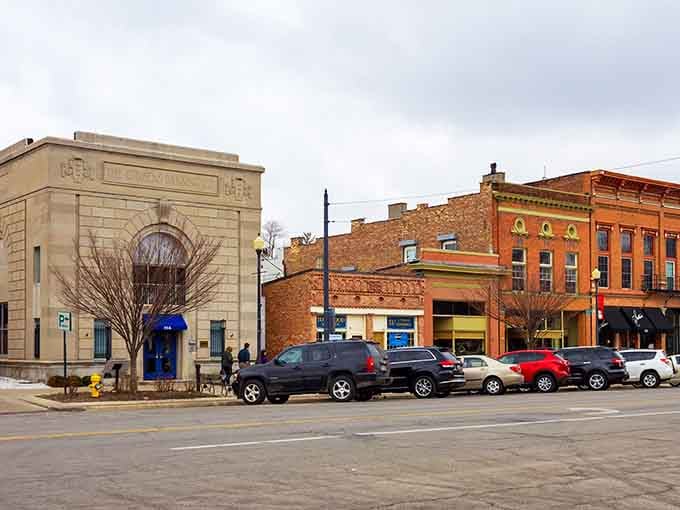 That beautiful bank building with the blue door stands proud, anchoring downtown like a dependable old friend.