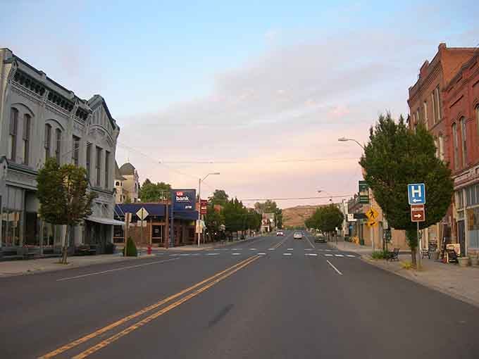 Golden hour transforms downtown into a postcard, with historic facades glowing under pastel skies that painters dream about.