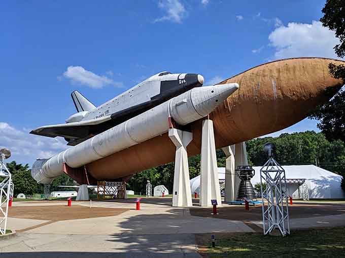 That's a real Space Shuttle sitting there like it just parked for lunch, absolutely magnificent against the Alabama sky.