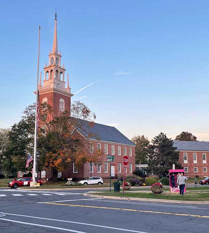 That brick church steeple has been pointing heavenward since your great-grandparents were courting on this very green.