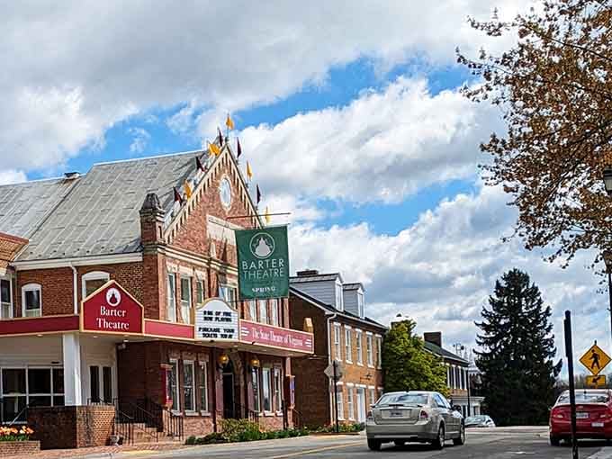 Those dramatic clouds framing historic brick buildings create a postcard moment that happens here every single day.