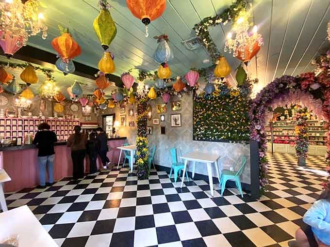 Step inside where paper lanterns float overhead like colorful dreams and checkered floors invite pure whimsy.