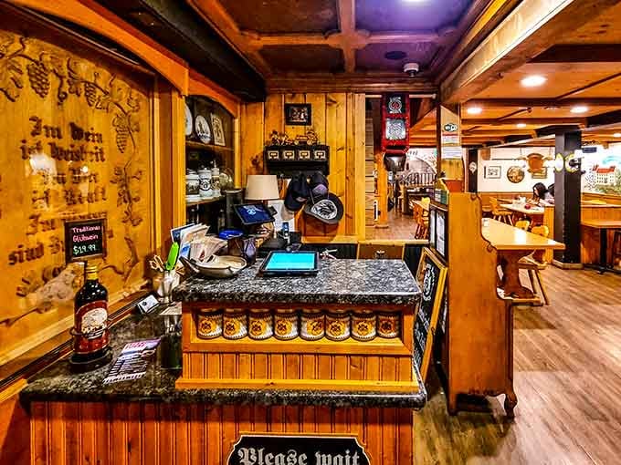 Wood paneling and beer steins create that cozy keller atmosphere where strangers become friends over schnitzel and lager.