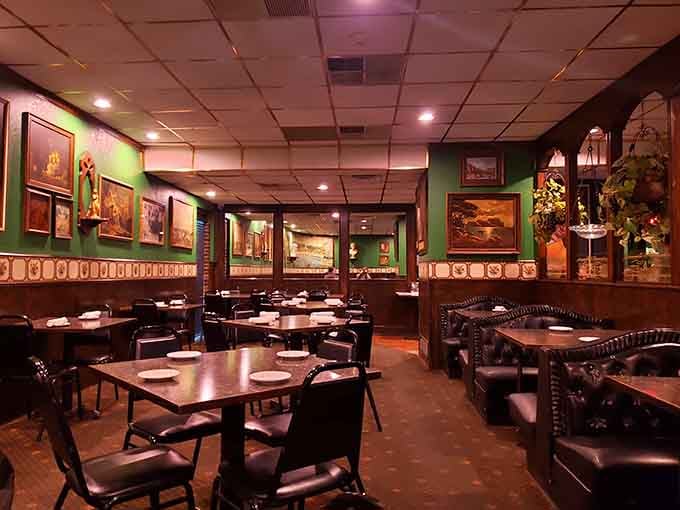 Green walls and warm lighting create an atmosphere that feels like Sunday dinner at your favorite aunt's house.