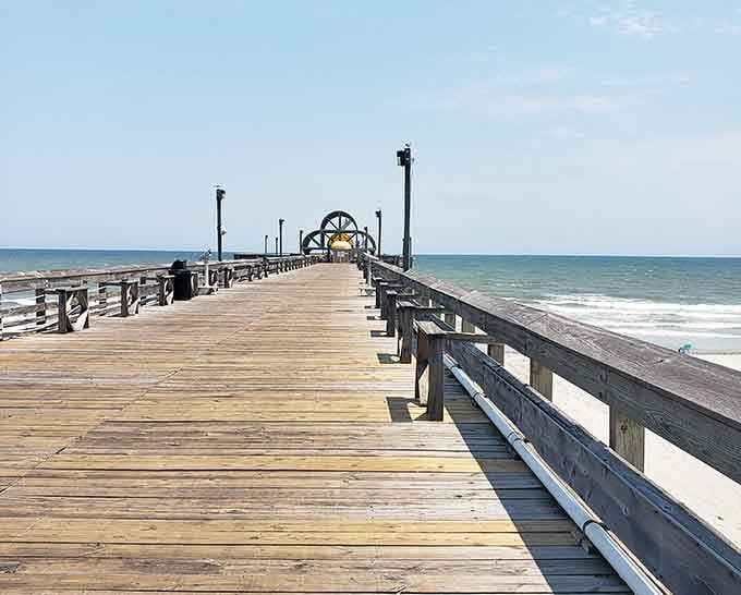 A wooden runway to paradise, stretching so far you'll wonder if you accidentally booked a transatlantic flight.