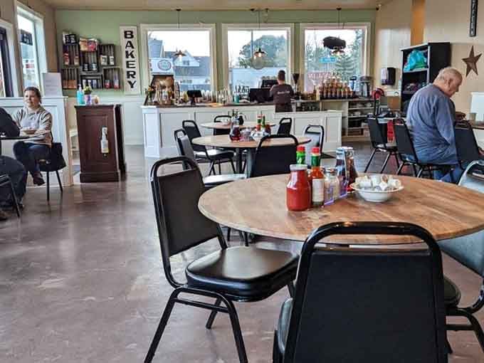 Simple tables, good lighting, and a bakery sign that means business. This is breakfast done right.