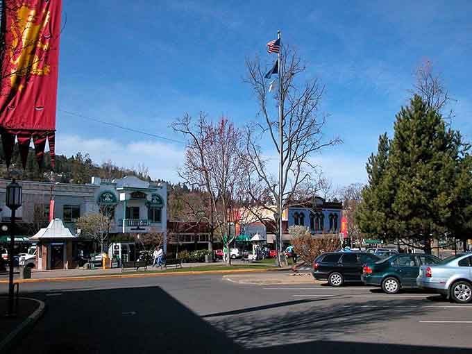 The plaza buzzes with that rare energy where culture vultures and mountain lovers peacefully coexist over excellent coffee.