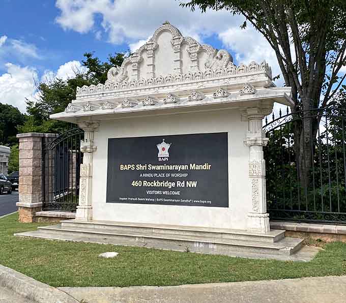 That moment when suburban Georgia casually drops a hand-carved marble entrance like it's no big deal whatsoever.