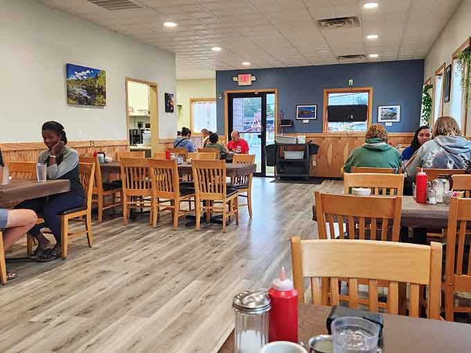 Simple wooden tables and natural light create the kind of breakfast atmosphere that feels like home.