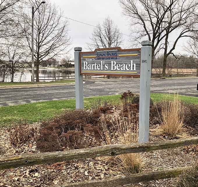 Your destination awaits behind this welcoming sign, where summer memories are made and stress evaporates like morning mist.