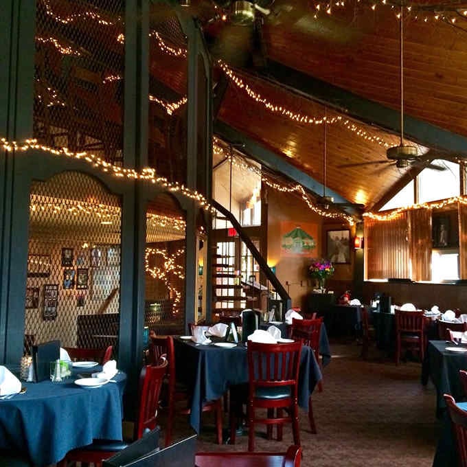 Twinkle lights and dark wood create the kind of ambiance where marriage proposals happen between bites of ribeye.