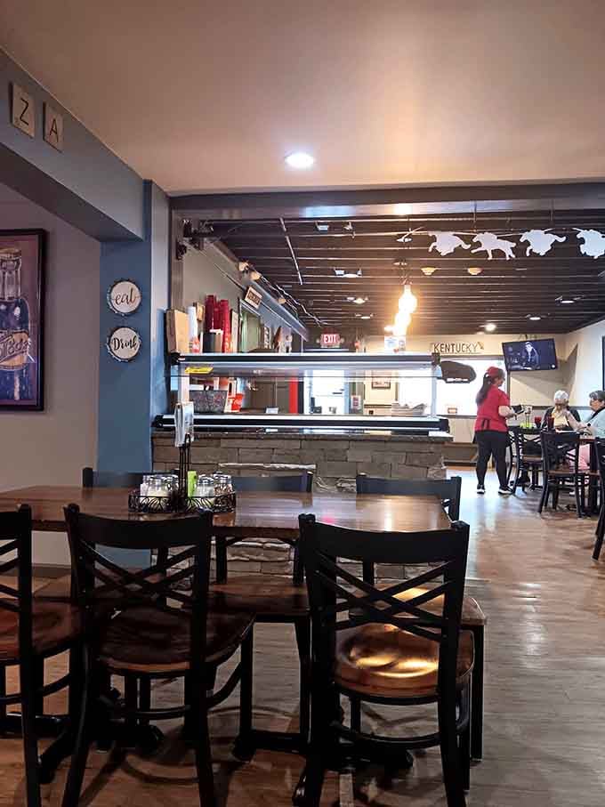 Clean, comfortable, and unpretentious, this dining room knows the star of the show arrives on a round pan.