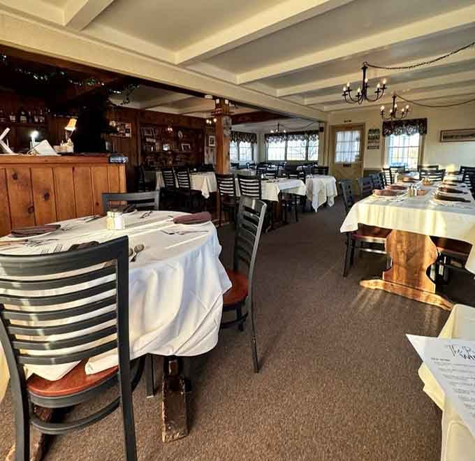 White tablecloths and warm lighting create that timeless steakhouse atmosphere where memories are made over perfectly cooked beef.